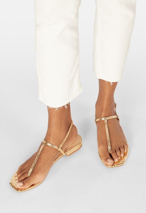 On The Run Flat Sandal in Gold - Get great deals at JustFab